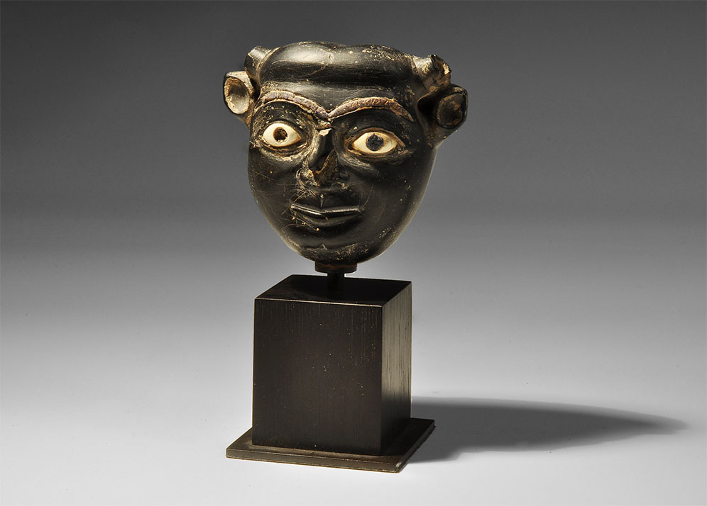 Western Asiatic Sumerian Demon Head - auctions & price archive